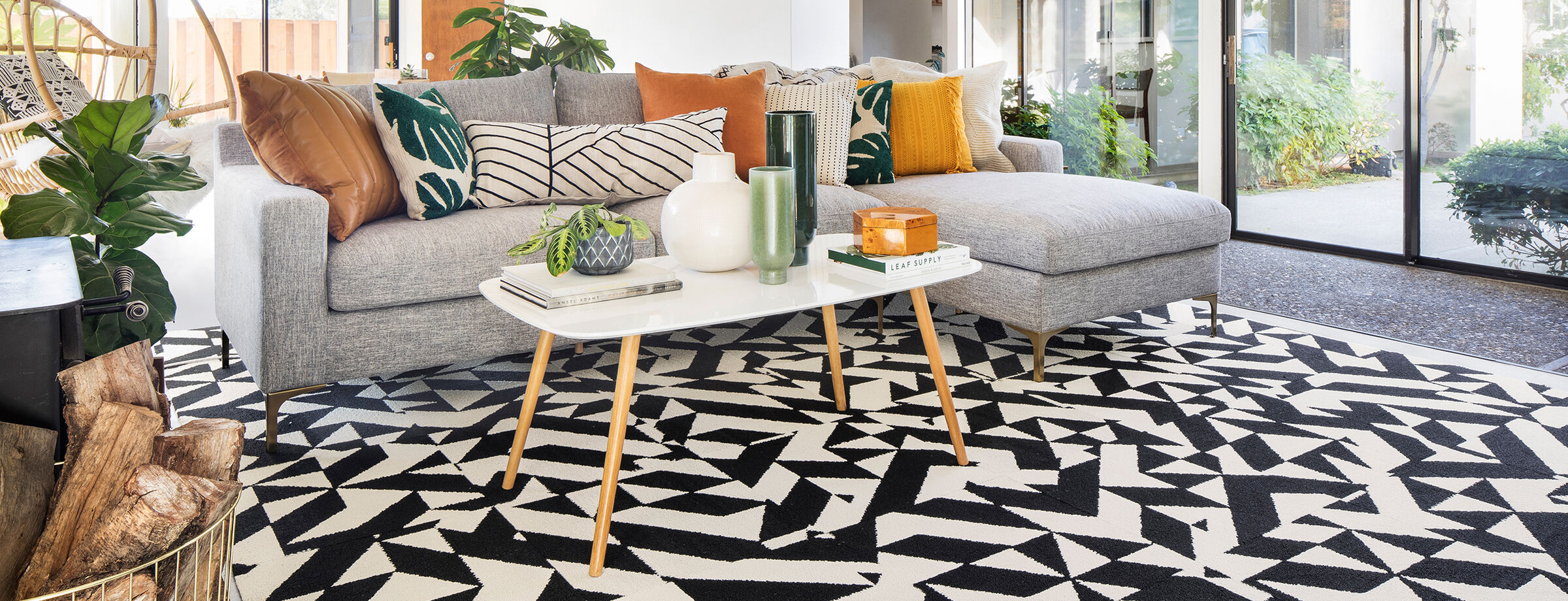 Twisted Spokes - Black: Patterned Area Rugs & Carpet Tiles by FLOR